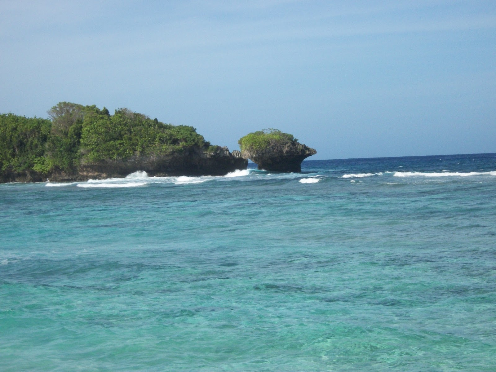 tipping guam over: Haputo beach