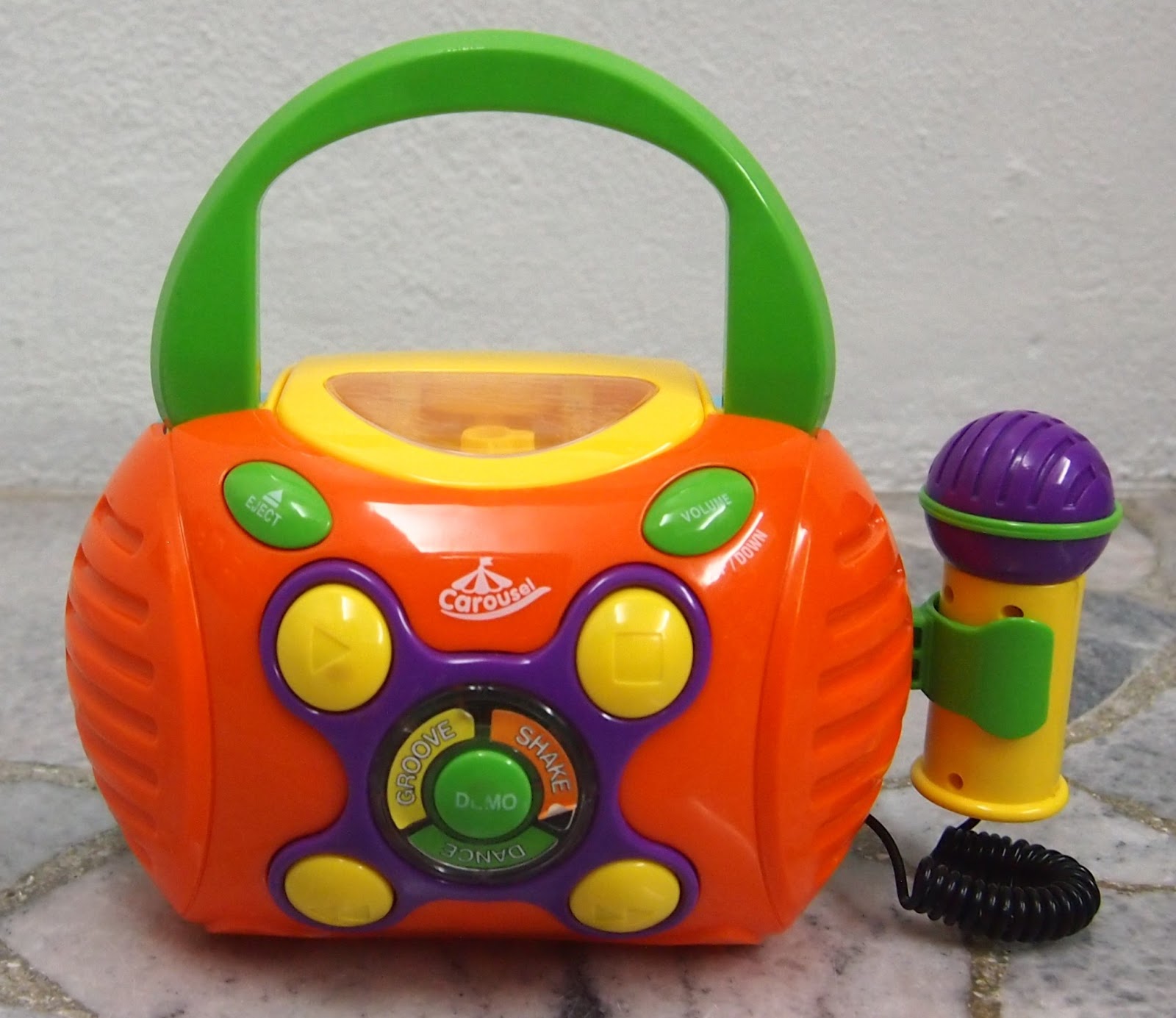 JuaiMurah: Carousel Cd Boom Box with Mini Microphone
