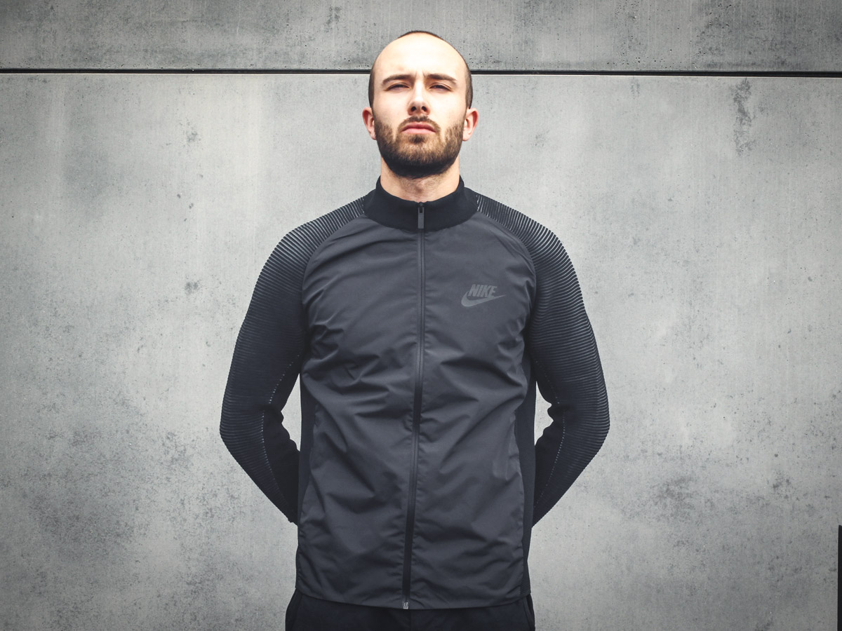 SOLEKITCHEN: Nike Tech Knit Dynamic Reveal Varsity Jacket - Black