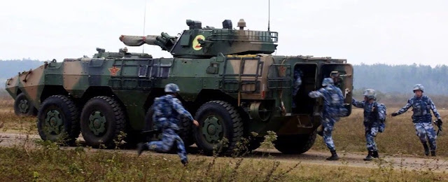 China Defense Blog: PLAN Marine's two new wheeled light tanks