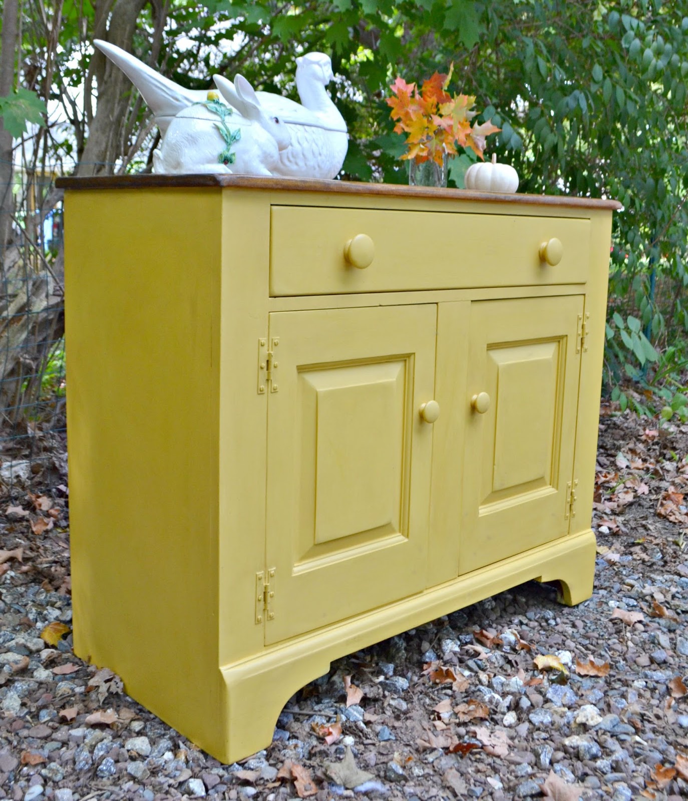 Heir and Space: A Vintage Cupboard in Buttercream Yellow