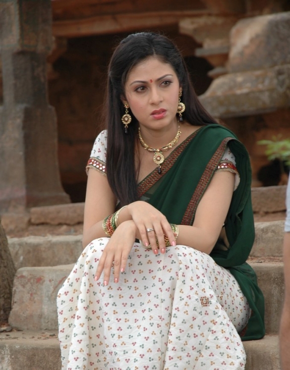 Actress Sada looking photo shoot stills in green printed Half saree