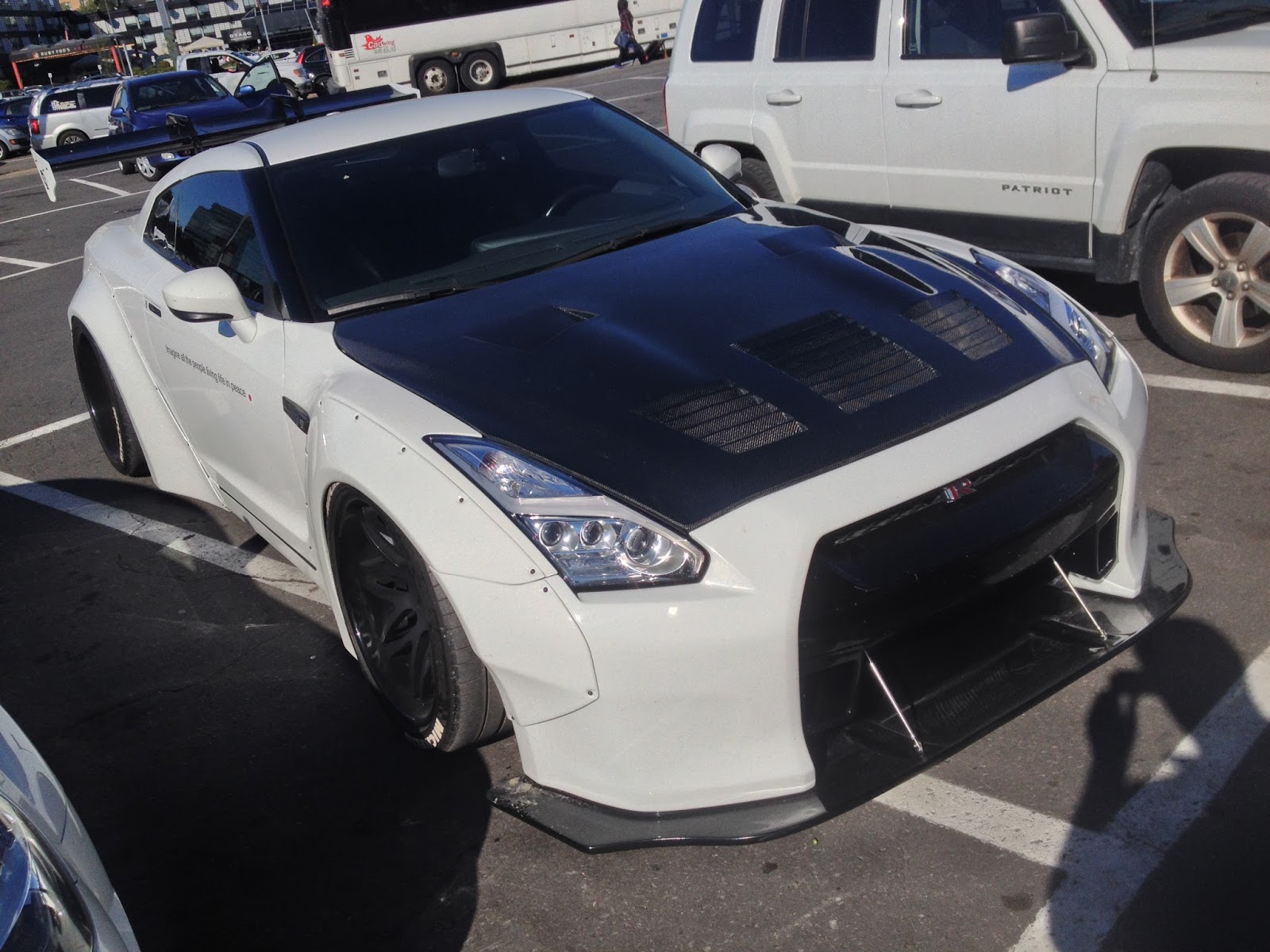 700 HP Wide Body Nissan GTR Slammed on Air Ride Suspension