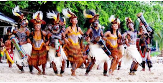 TARI PERANG TRADISIONAL DARI PAPUA DAN NOKEN MASYARAKAT PAPUA