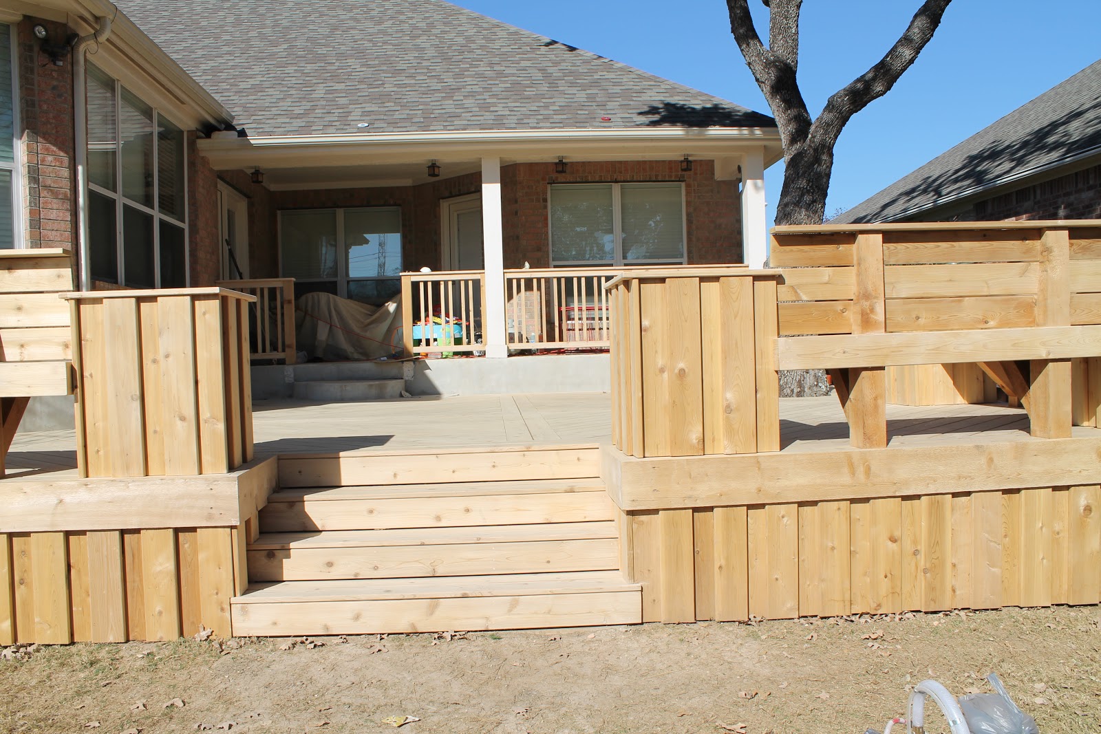 Whitehead Renovations: Elevated Cedar Deck - Diagonal to Center