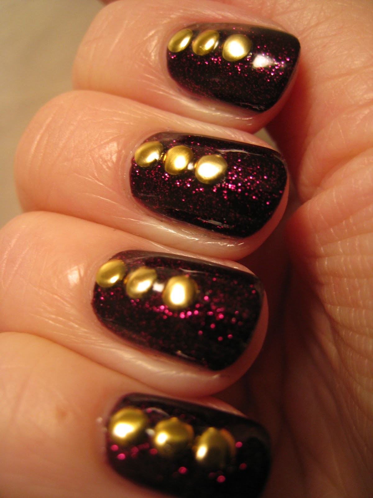 Naily perfect: Nail Pop Glam Rock topped with gold studs