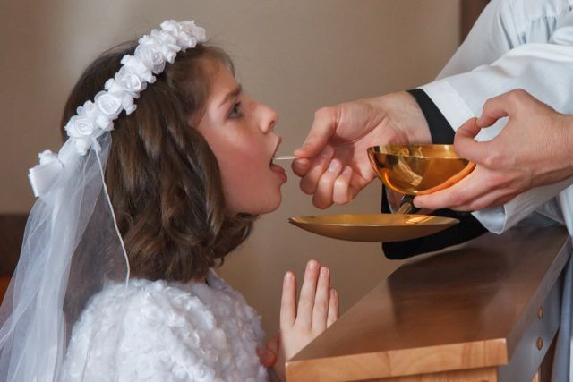 Shower of Roses: A Traditional Latin Mass and First Holy Communions