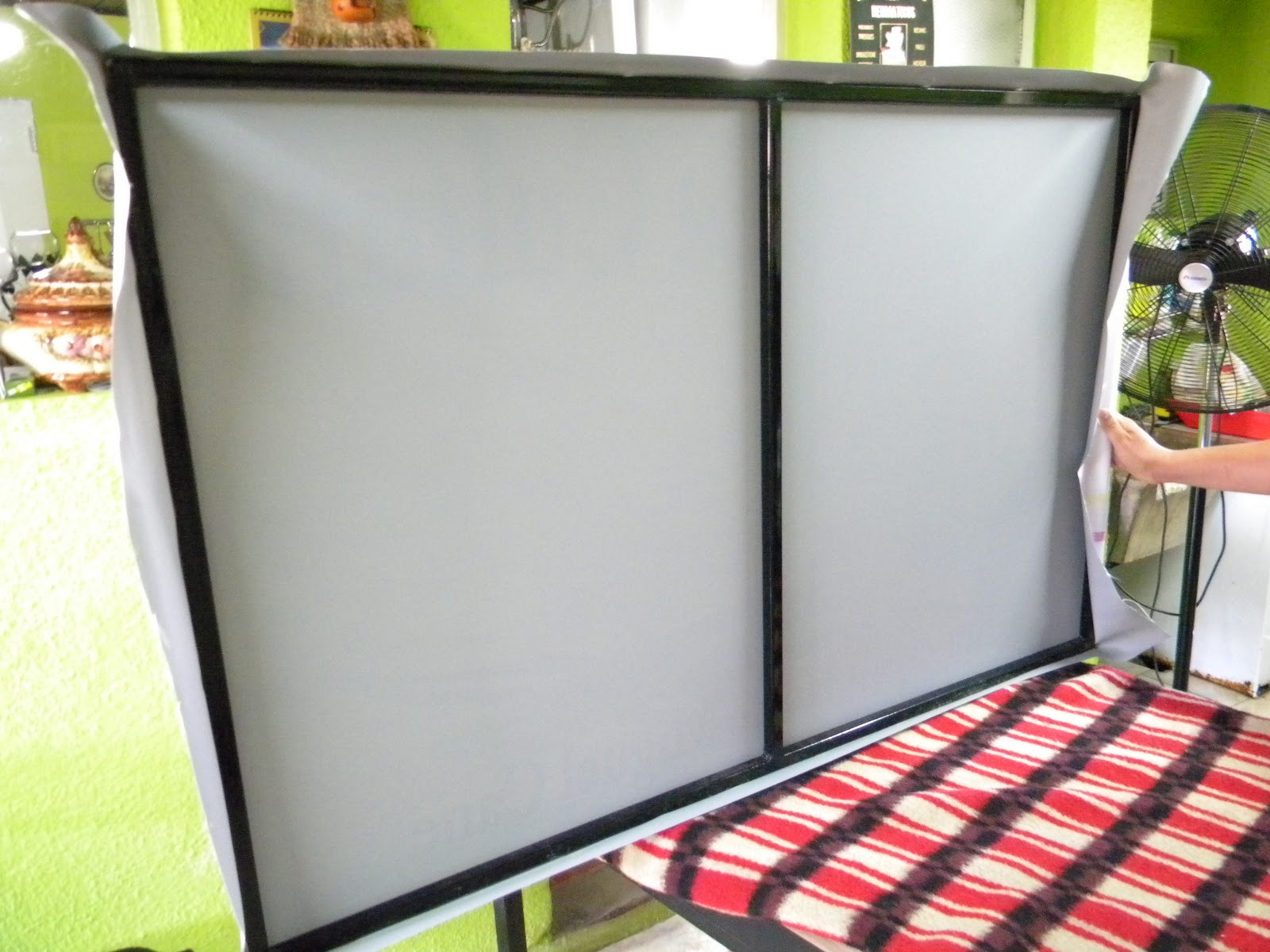 IDEAS CARTELES: proceso de tensado de lona front