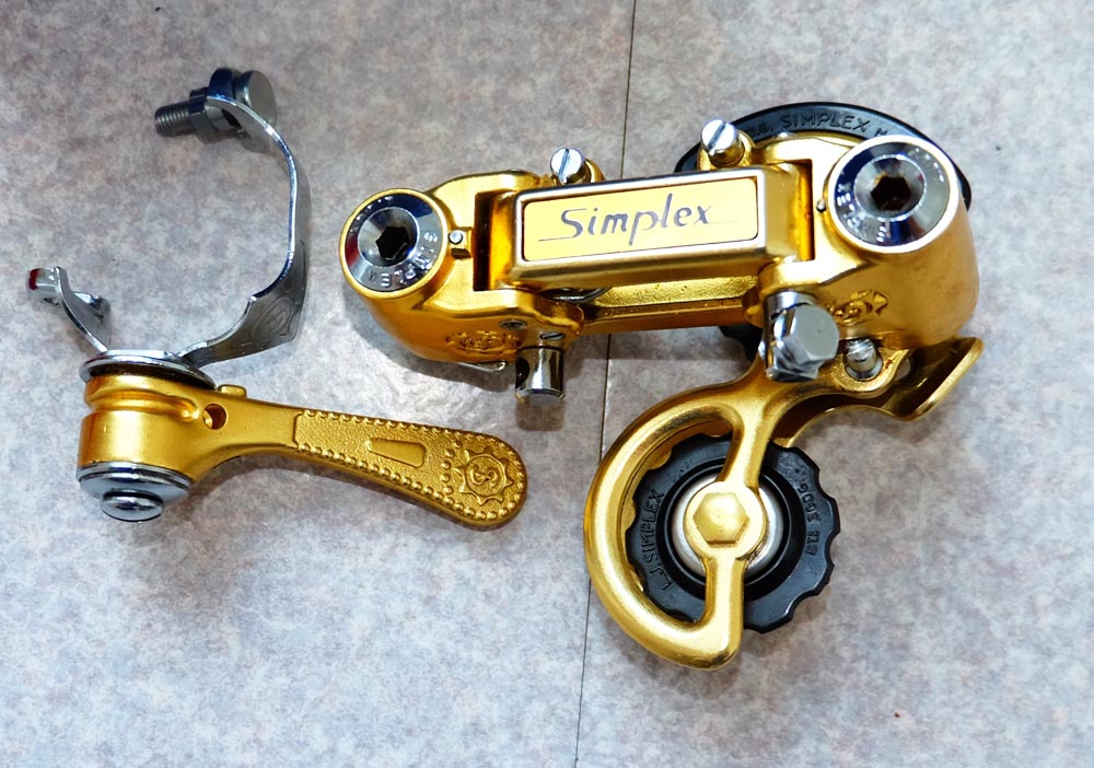 Velosepia: Vintage Prestige Simplex Gold Super L.J rear derailleur & single Shifter with cable-guide