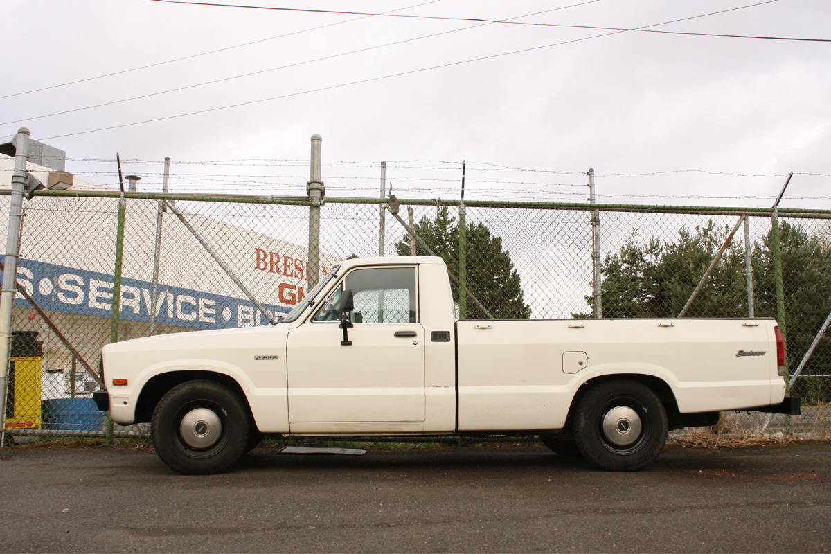 OLD PARKED CARS.: 1983 Mazda Sundowner.
