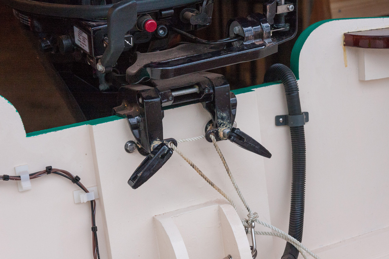 Michael's Boatbuilding Blog: Bolting the motor to the Utility