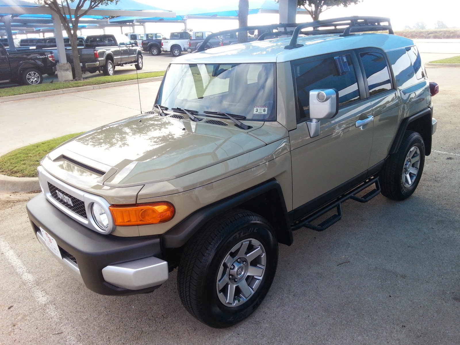 TDY Sales 817-243-9840 — Only 3k miles Loaded Tan 2014 Toyota FJ Cruiser...
