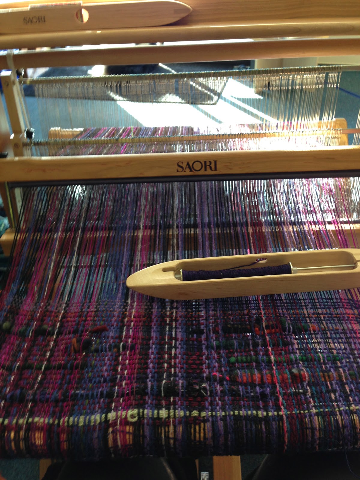 CENTERING WITH FIBER: Saori weaving as a featured artist at a local gallery