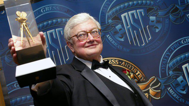 World first: Roger Ebert funeral new pics
