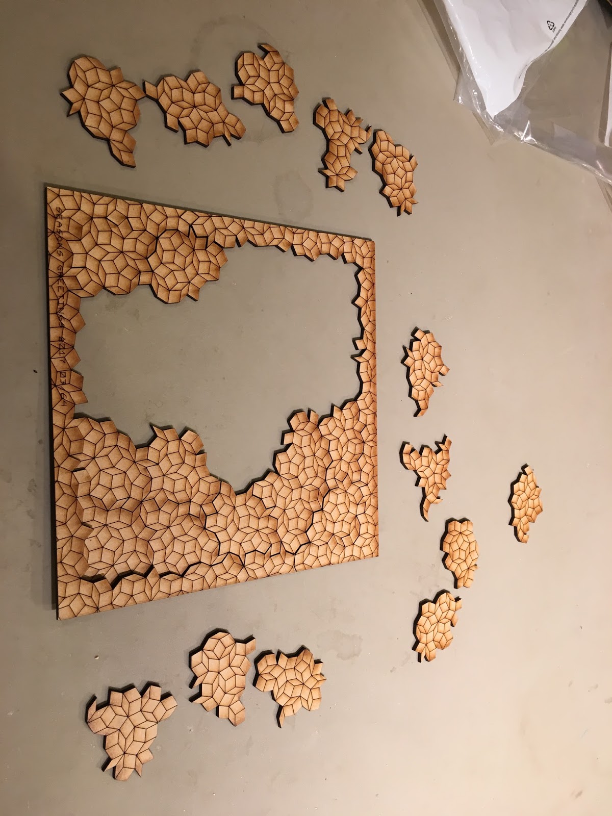 Rebecca's Wooden Jigsaw Puzzles: Laser-cut geometric puzzle in frame