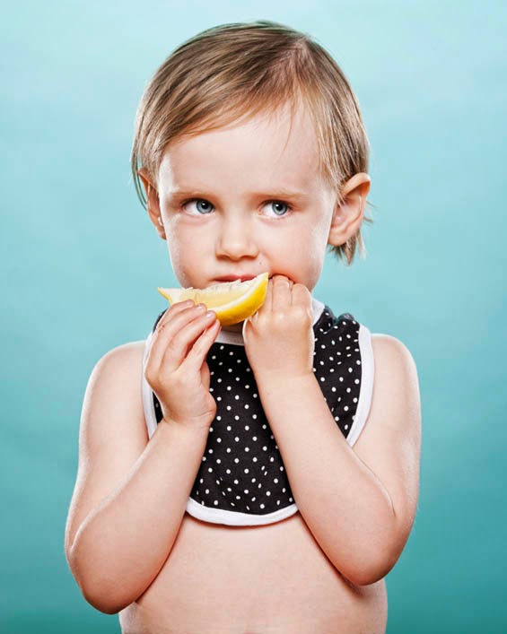 Social Dashboard: Portraits of children tasting lemon for the first time