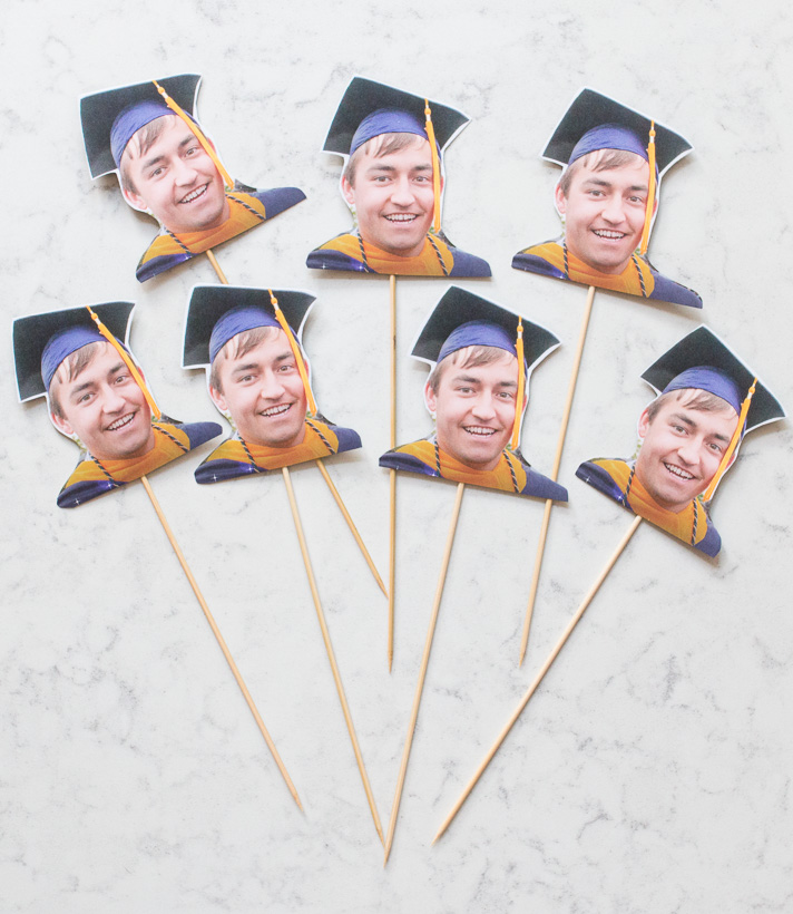 DIY Graduation Decorations: Party Sticks & Photo Garland | 17 Apart