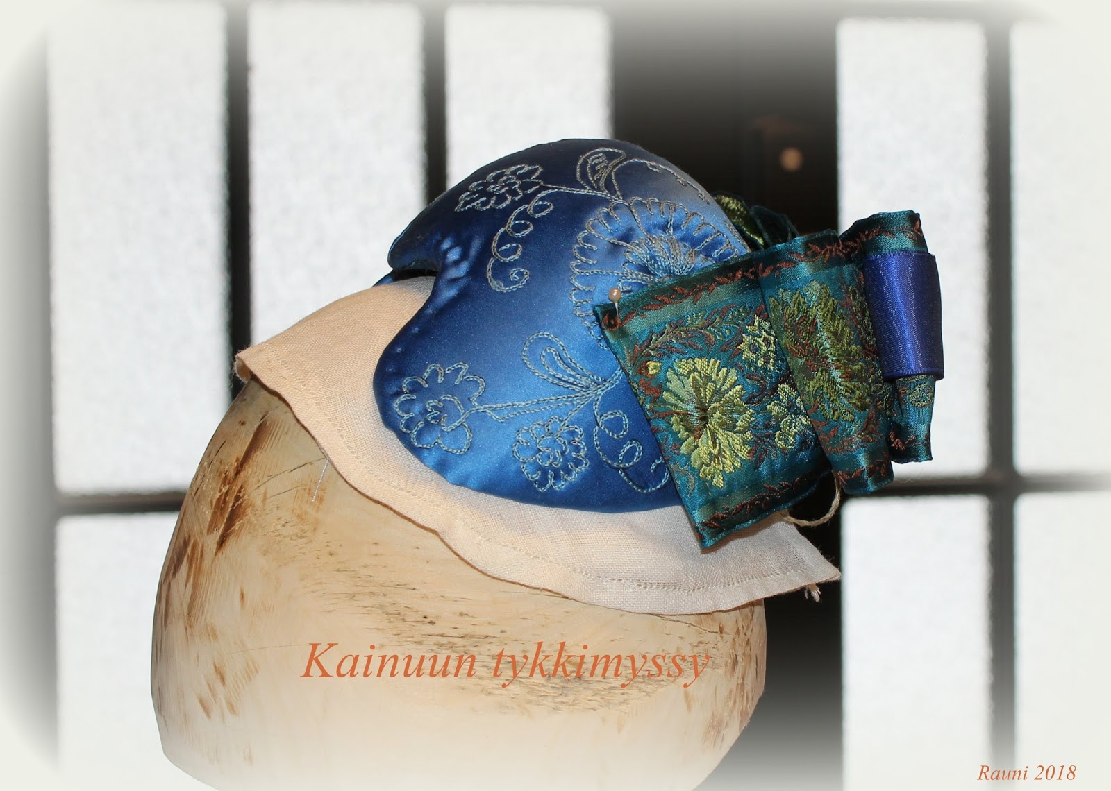 Rauni Elfving: KAINUUN KANSALLISPUKU...