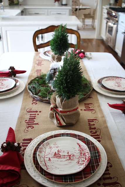 A Nature Inspired Christmas Tablescape Featuring Plaid, Pines, and Burlap