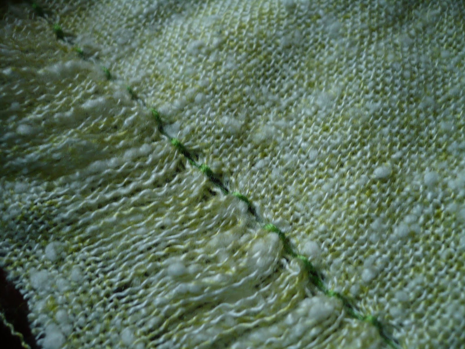 pick out the threads from both the layers of the fabric.