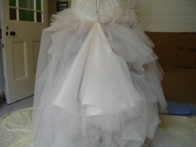 all the little things: back of dress showing tulle bustle