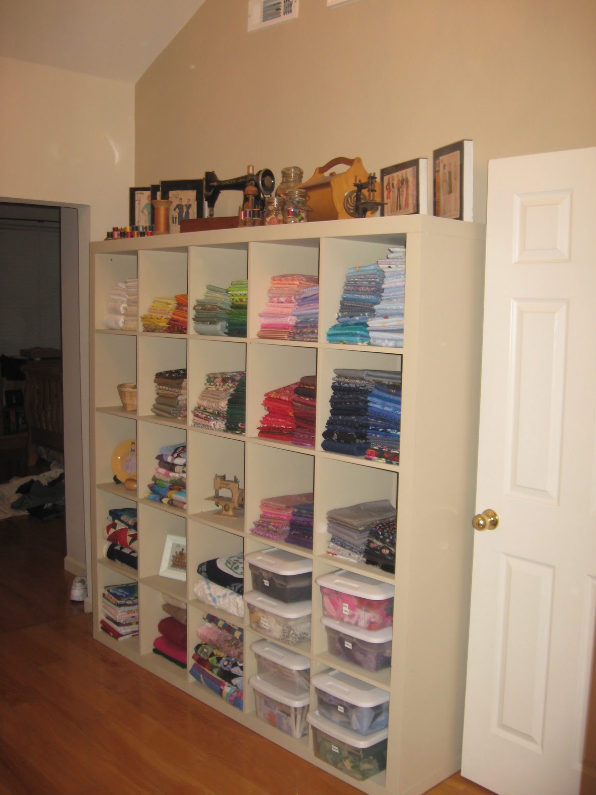 On top of the shelf I added a bunch of my antique sewing tchoskies.