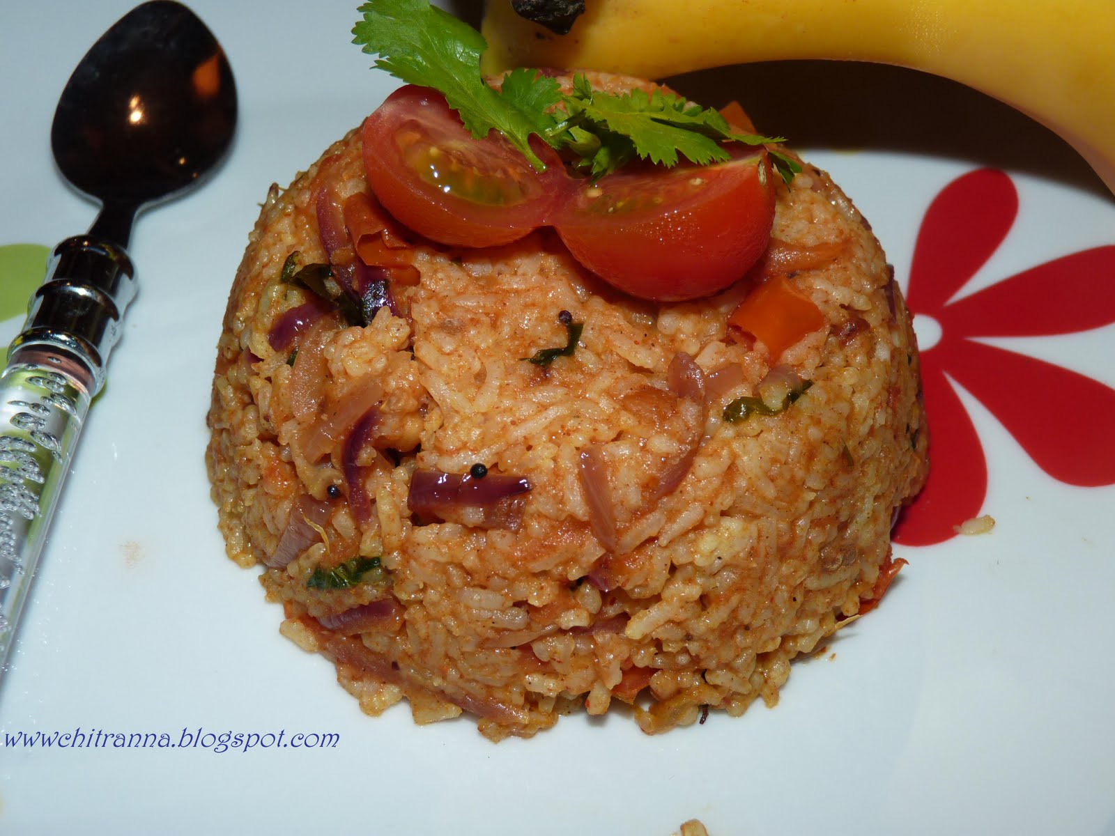 Chitranna: Pav Bhaji masala rice and a simple banana Dog(Fruit carving)