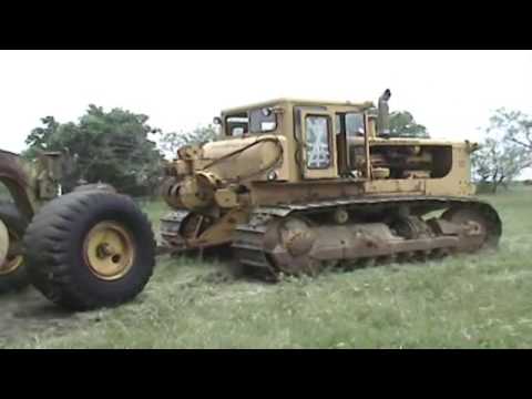 Tractor: Cat D9 with LeTouneau Pull Scraper