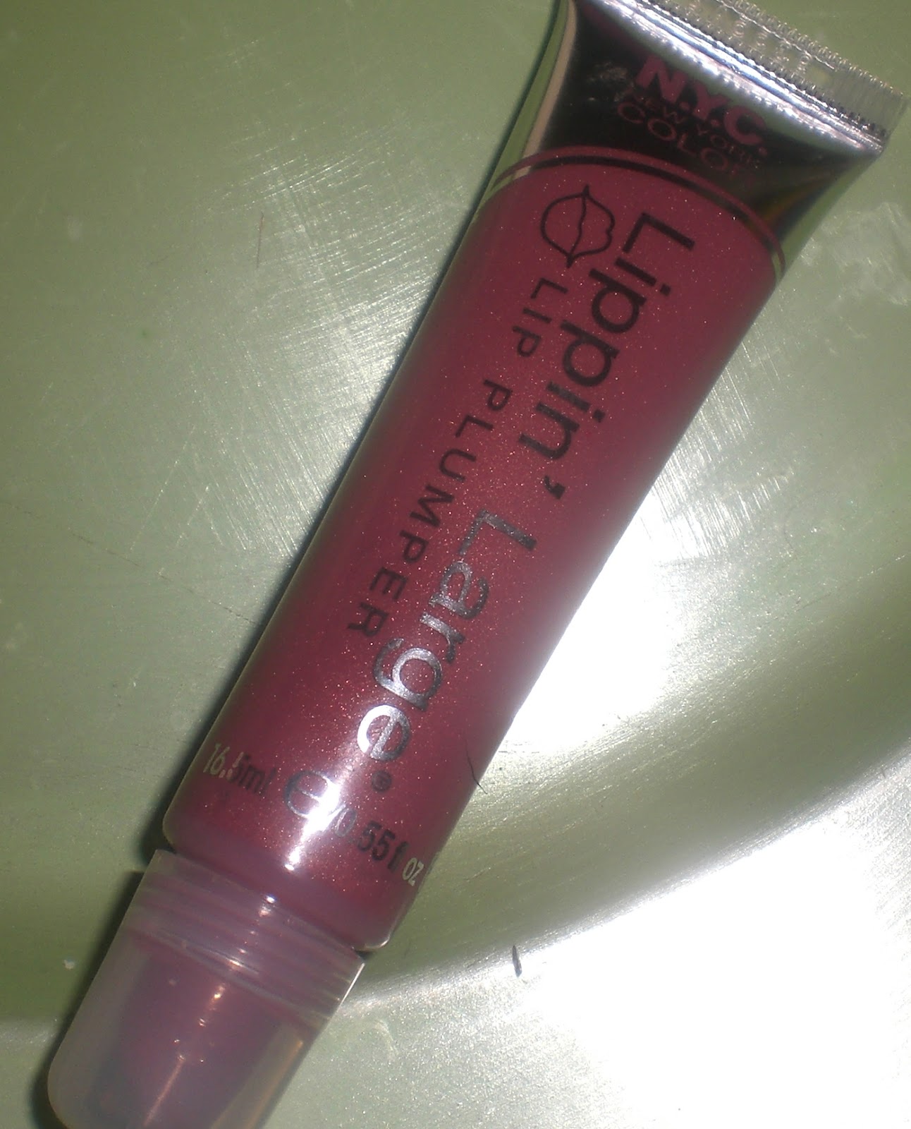 Cotton Candy Fro: N.Y.C Lippin' Large Lip Plumper in Plum Tart