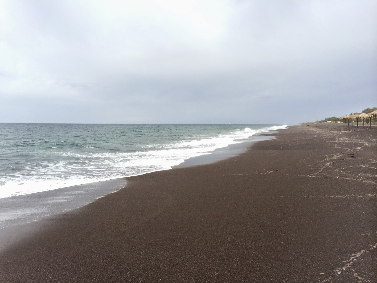 Perissa Beach (Black Sand Beach) - Santorini, Greece - Travel is my ...