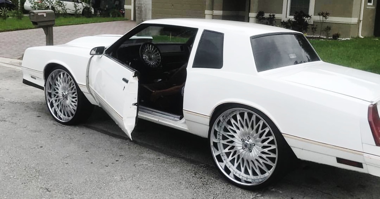 Ace-1: White Chevy Monte Carlo on 26" Asantis N Forgiatos