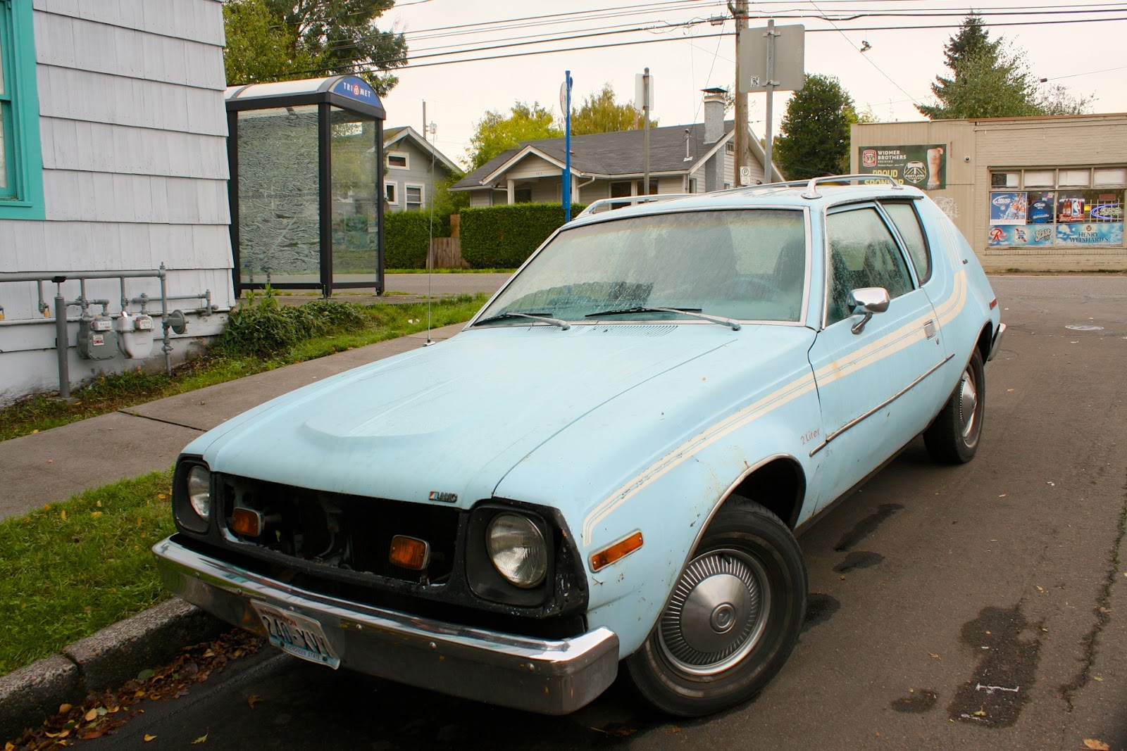 OLD PARKED CARS.: 1977 AMC Gremlin.