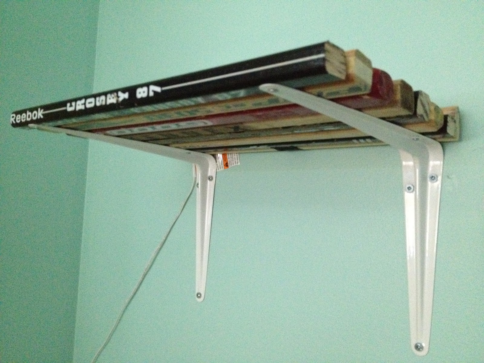 Stick This: DIY Shelf From Broken Hockey Sticks