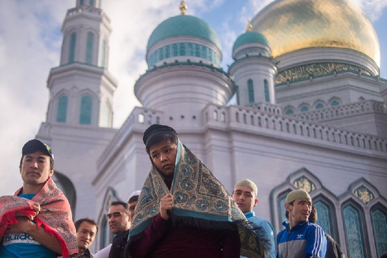 Muslims pray outside the Central Mosque, Moscow, Russia