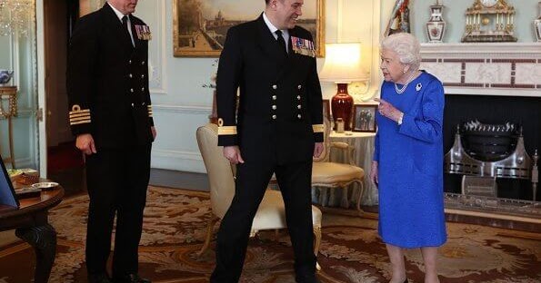 Queen Elizabeth II received Commodore Stephen Moorhouse and Captain ...