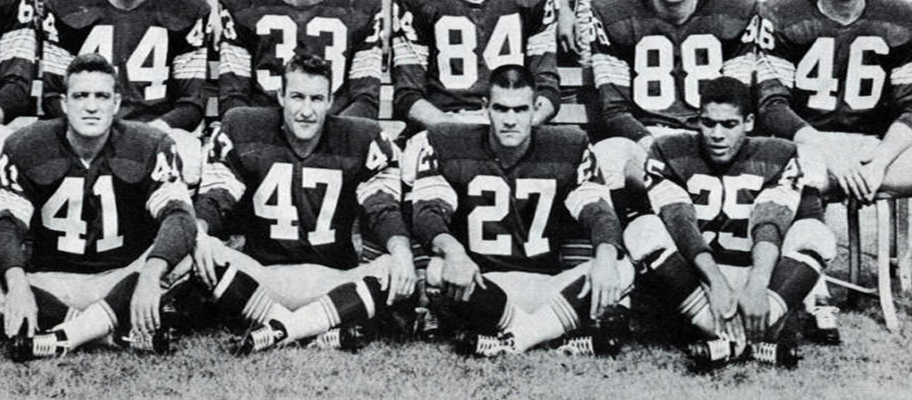 PACKERVILLE, U.S.A.: The John Symank Story — Part II