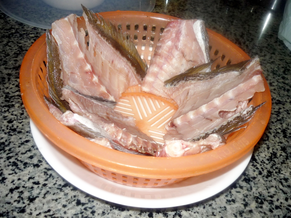 aunty celia's family meals: Sole fish bone with Sichuan preserved veg soup