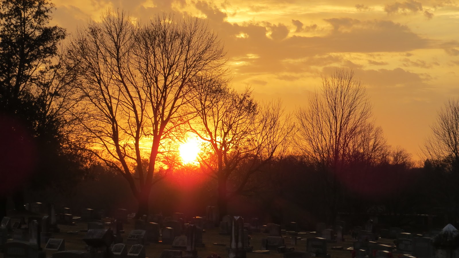 Let Your Light Shine: A Cemetery Sunset