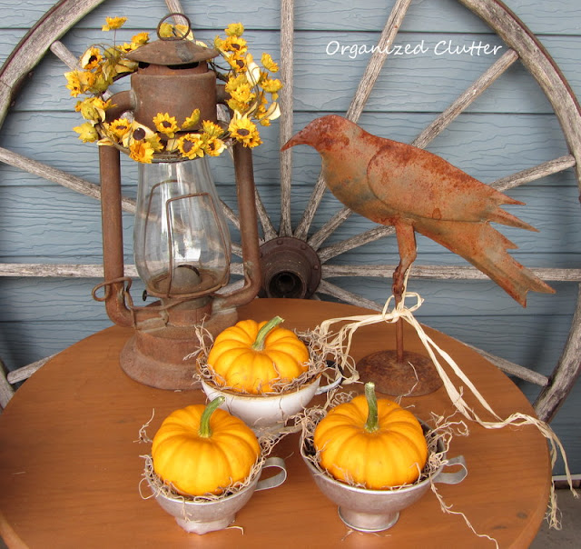 A Rustic and Vintage Fall Covered Patio - Organized Clutter