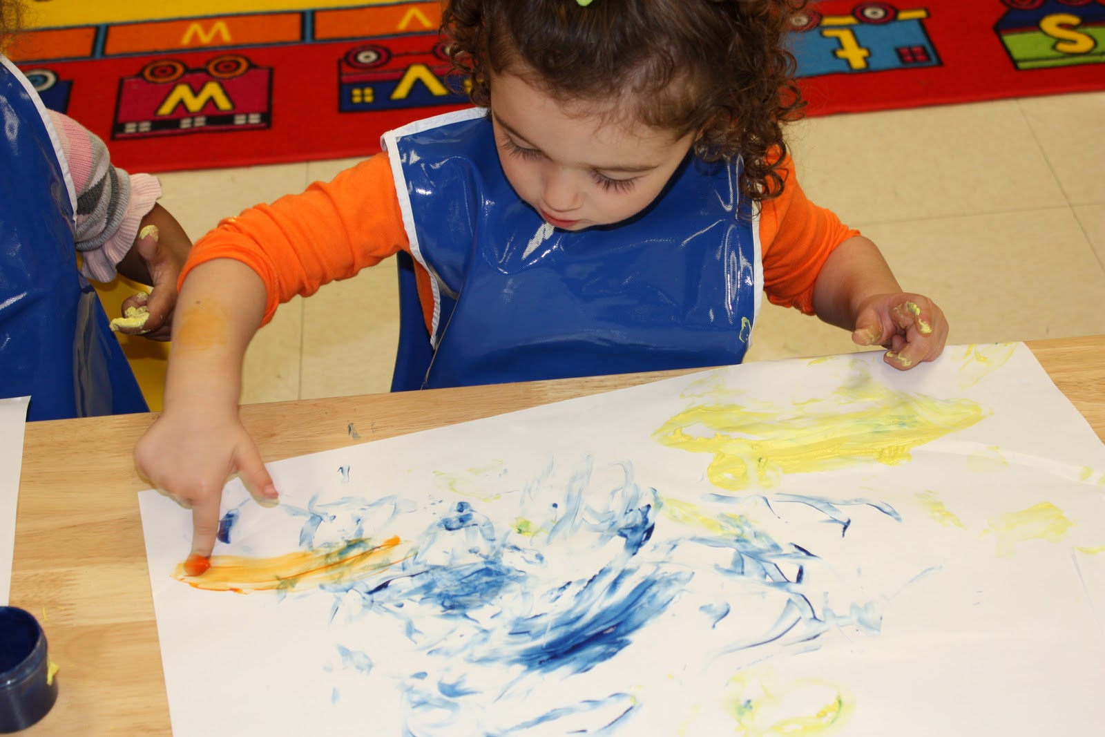 Sophia's Big Adventures: Finger Painting in Art Class