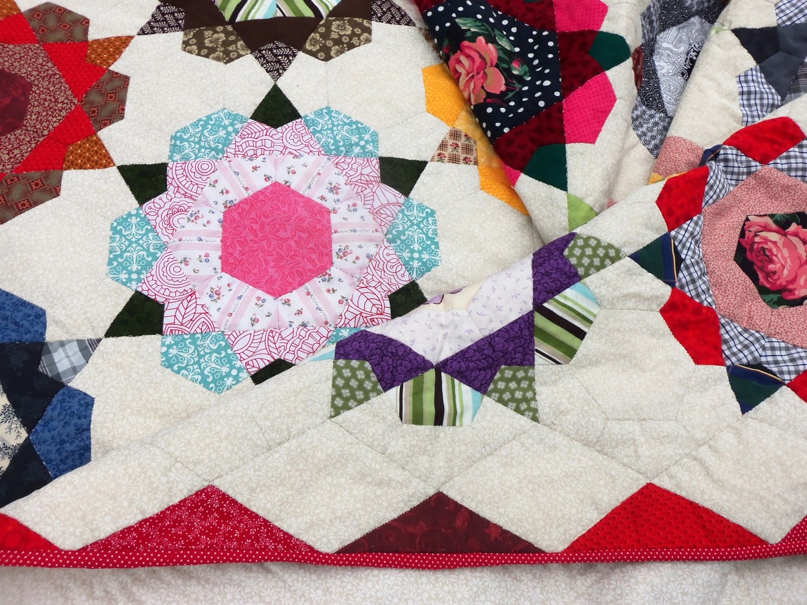 Orange explains it all: Rose Star quilt finished, at last.