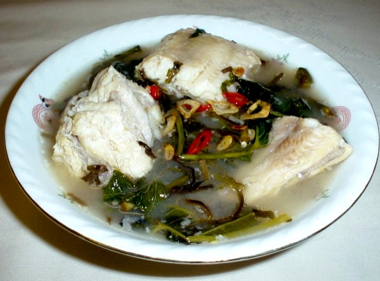 Salor machu takoun trey. ( Sweet, sour water spinach soup throughout ...