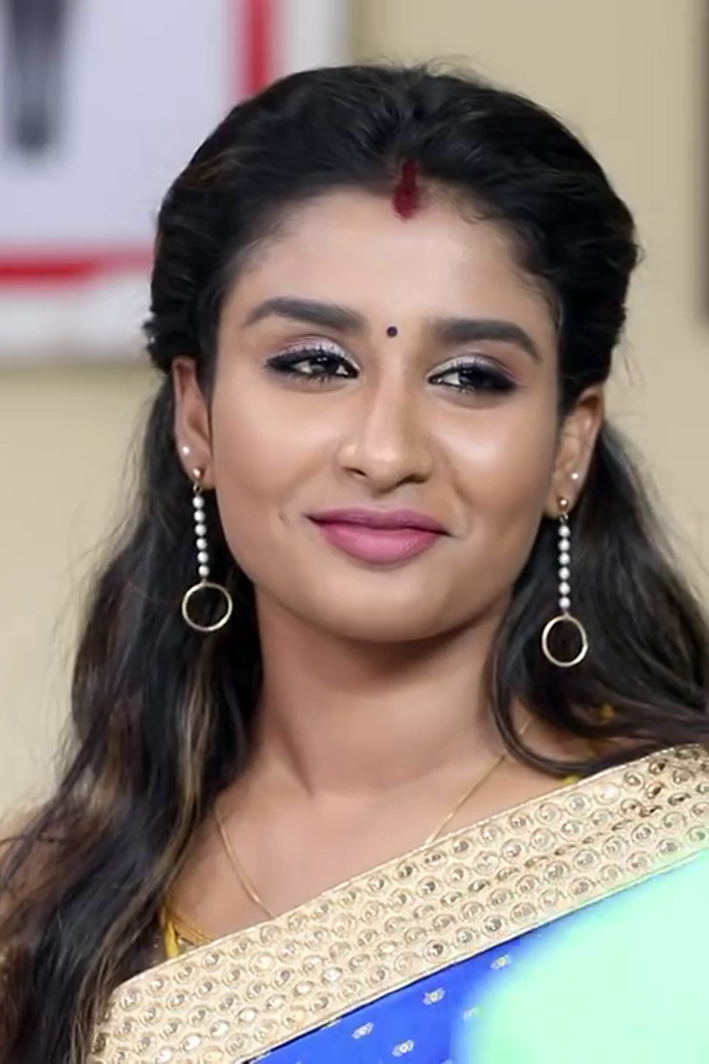 Actress Reshma Reya Beautiful Stills In Blue Saree