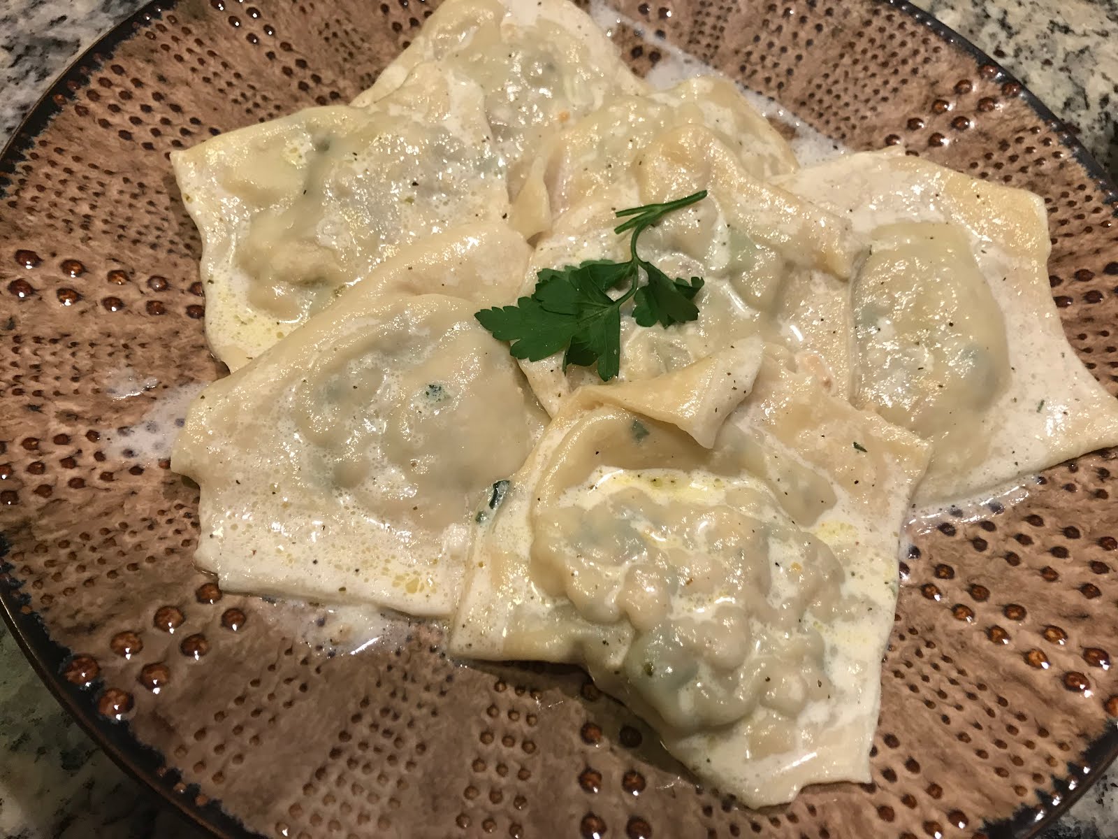 Homemade Roasted Garlic and Chicken Ravioli with Asiago Cream Sauce