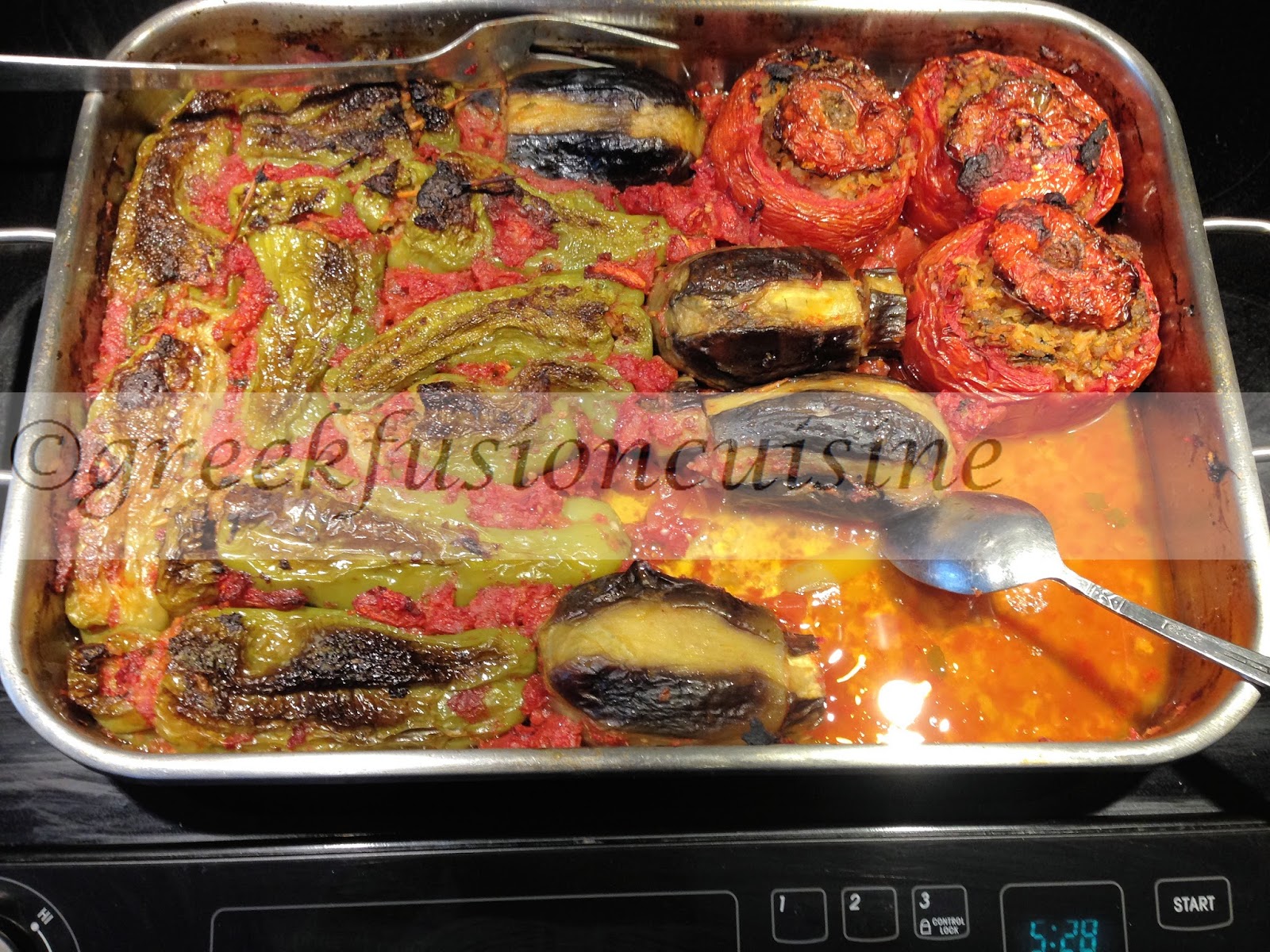 Greek Fusion Cuisine: Traditional stuffed peppers and tomatoes - Gemista