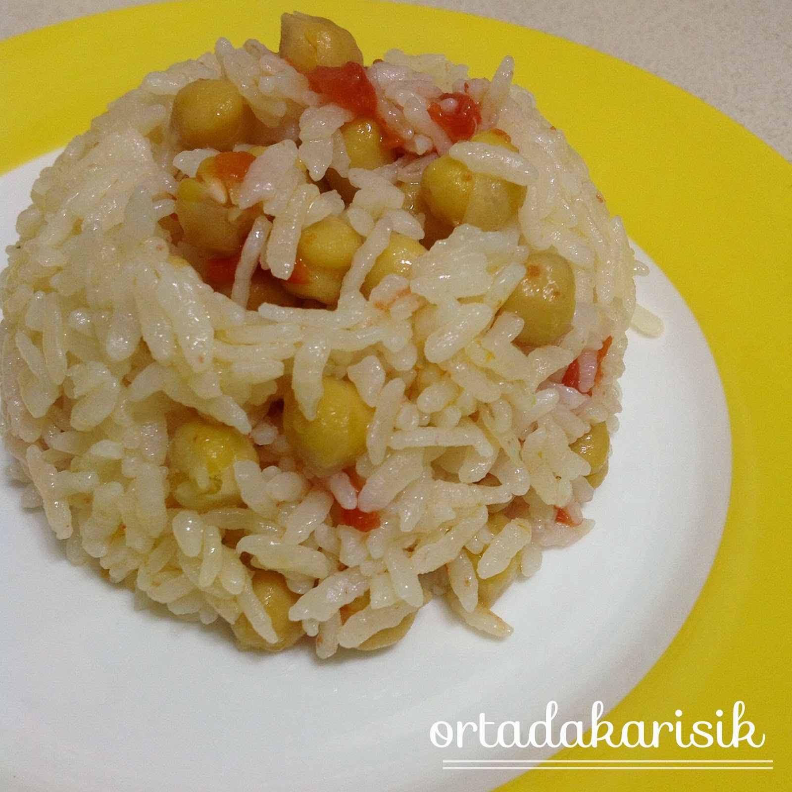 DOMATESLİ NOHUTLU PİLAV NASIL YAPILIR - HACERSENER.COM