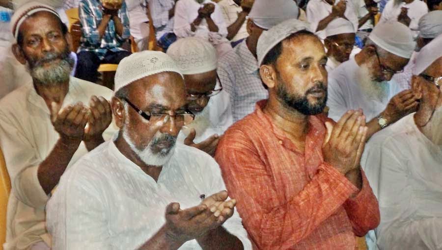 View Patna: Haj pilgrims offer prayers at Haj Bhavan