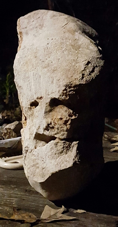 Archaeology of Portable Rock Art: Smiling and scowling human head ...