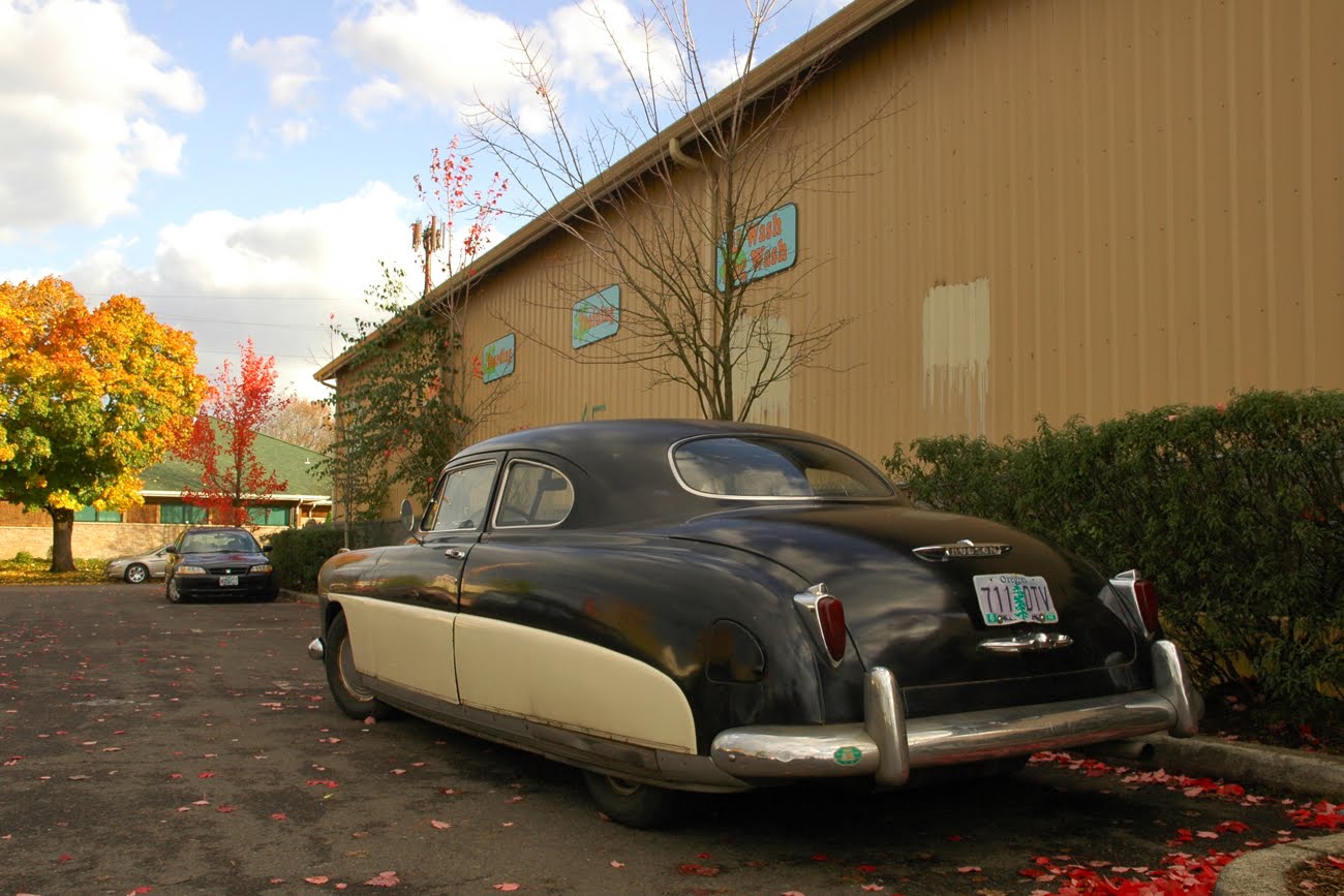 OLD PARKED CARS.: 1948 Hudson Commodore Coupe.