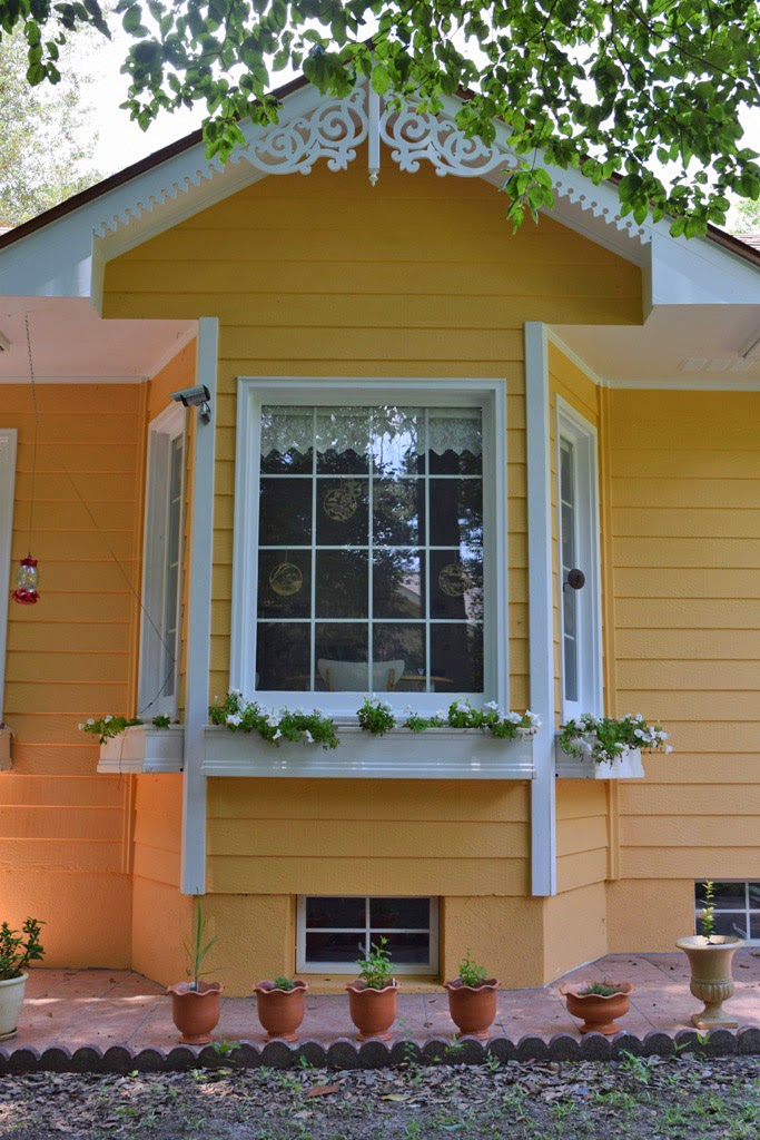 MARIETTE'S BACK TO BASICS: {Bay Window Patio with Potted Herbs}
